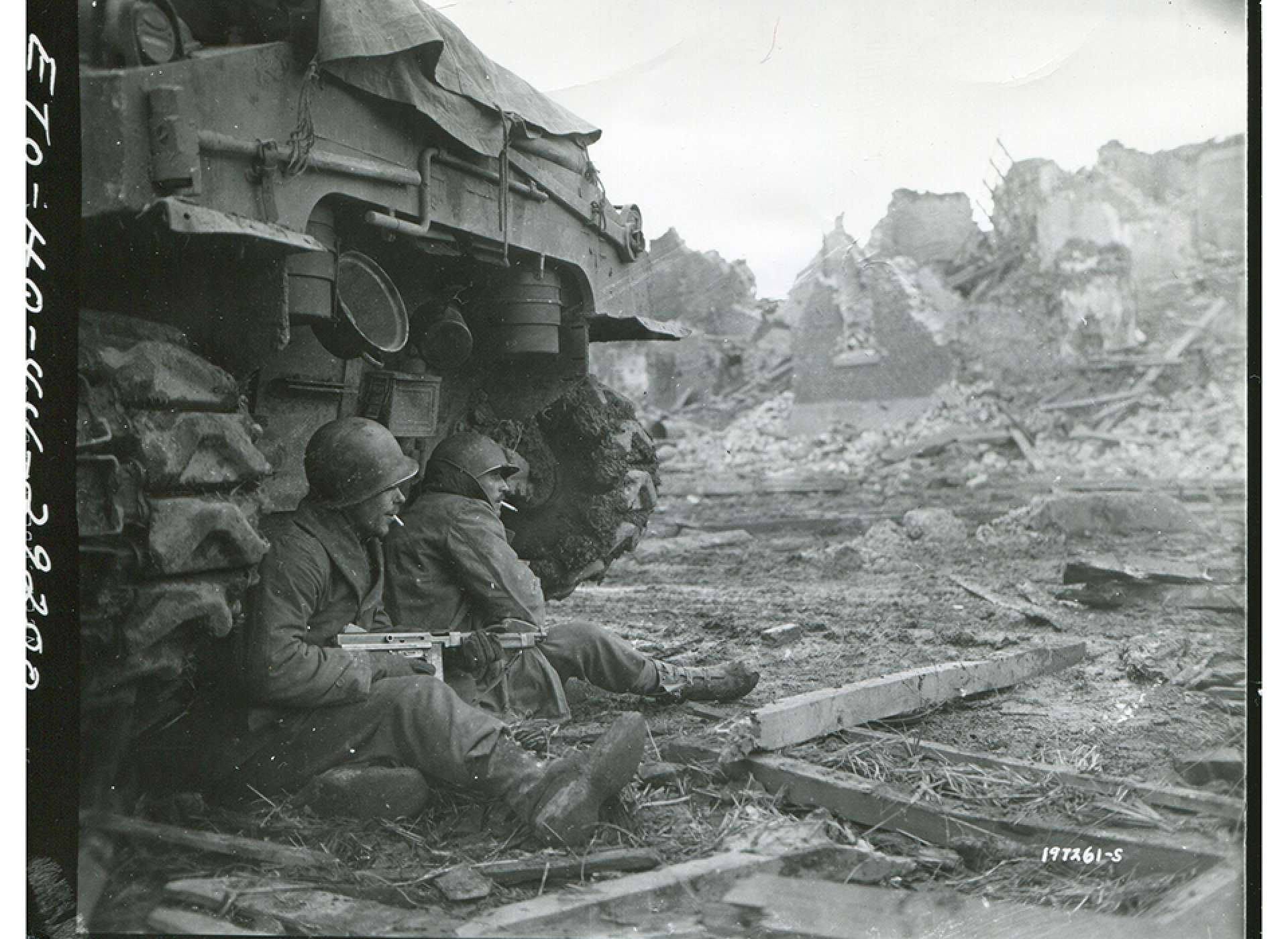 GIs from 2-60th Infantry, 9th Division, taking cover from the rain ...